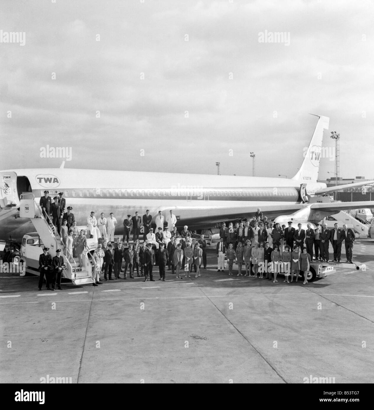 Transport. Aviation: Planes Boeing 707 personnel photographed alongside ...