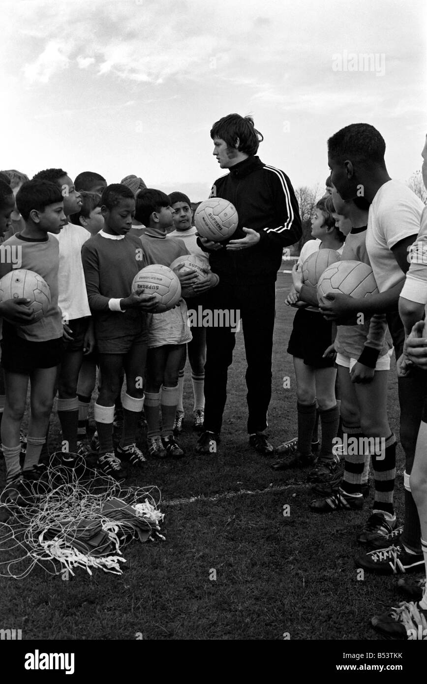 Sport football. Former player Peter Knowles coaching schoolboys in ...