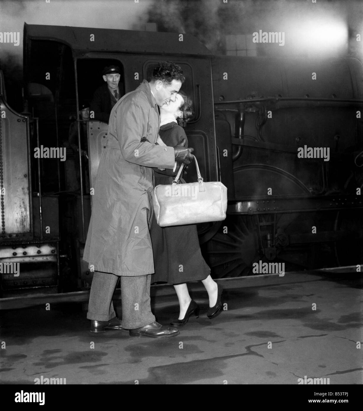 Couple saying goodbye train Black and White Stock Photos & Images - Alamy