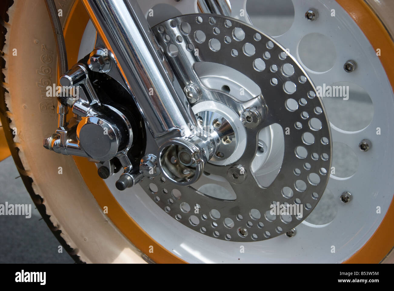 White custom wheel of a scooter with chrome disk brake Stock Photo - Alamy