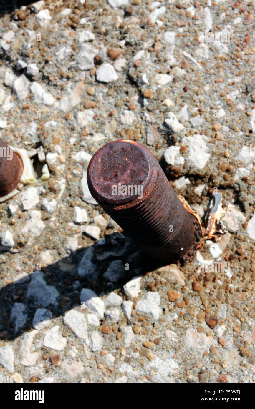 The top of a rusty anchor bolt in cement Stock Photo - Alamy