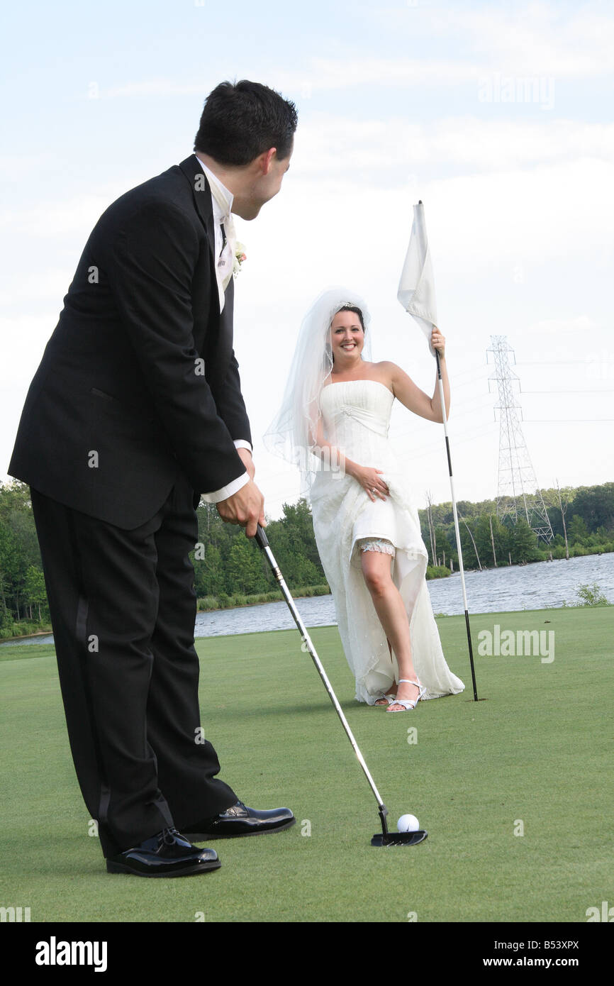 young just married couple having fun on the green putting Stock Photo ... young just married couple having fun on the green putting Stock Photo ...