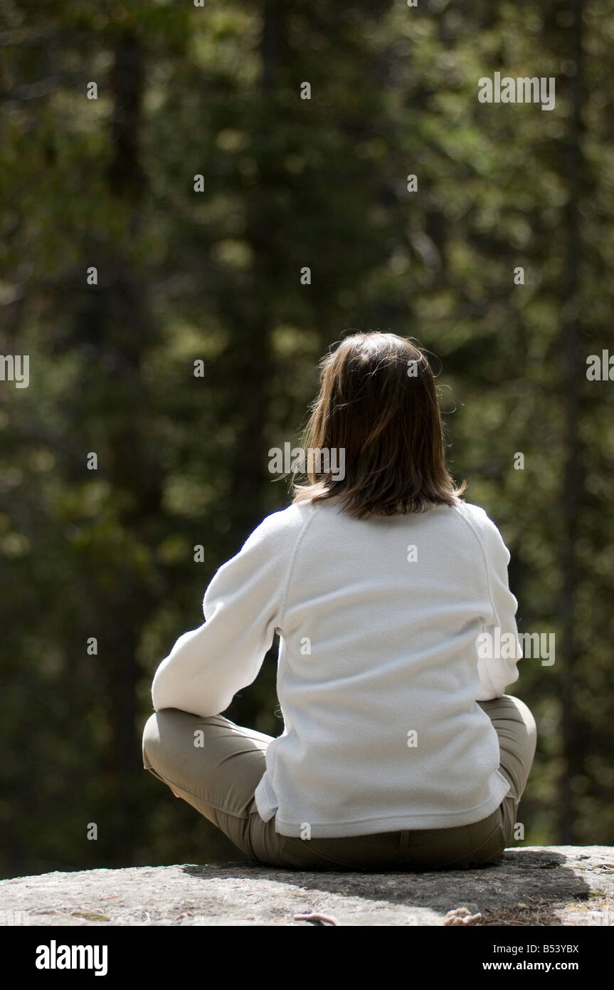 Woman in twenties meditating hi-res stock photography and images - Alamy