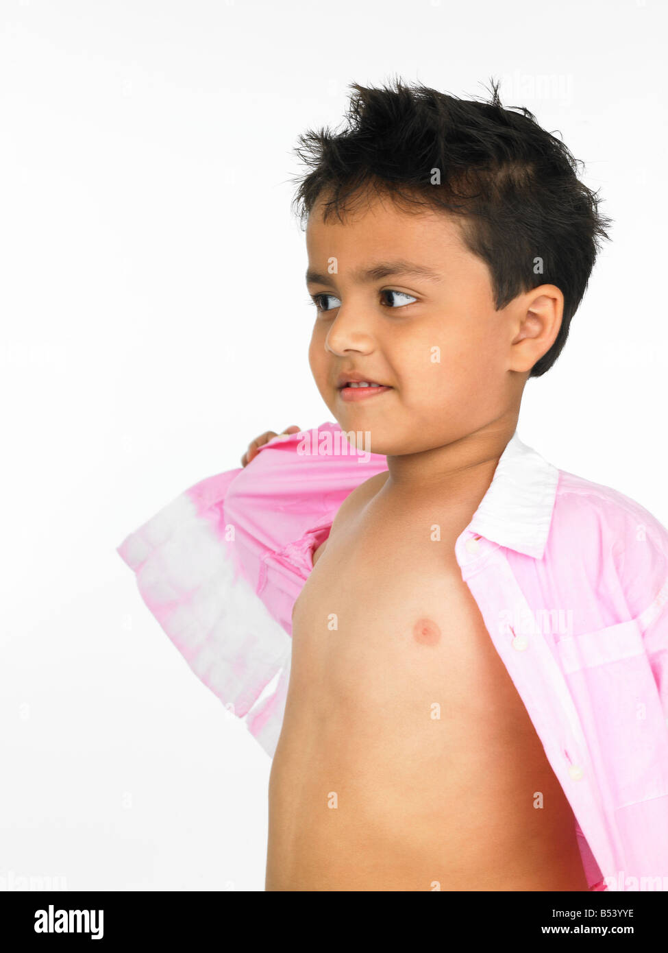 asian boy removing his shirt Stock Photo - Alamy