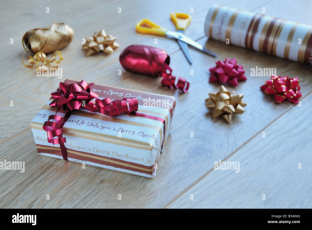 Christmas wrapping material and scissors Stock Photo - Alamy
