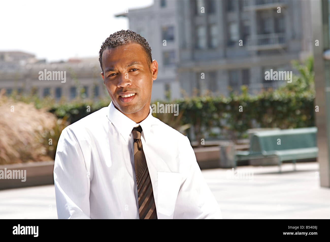 An confident and successful African American businessman in a power ...
