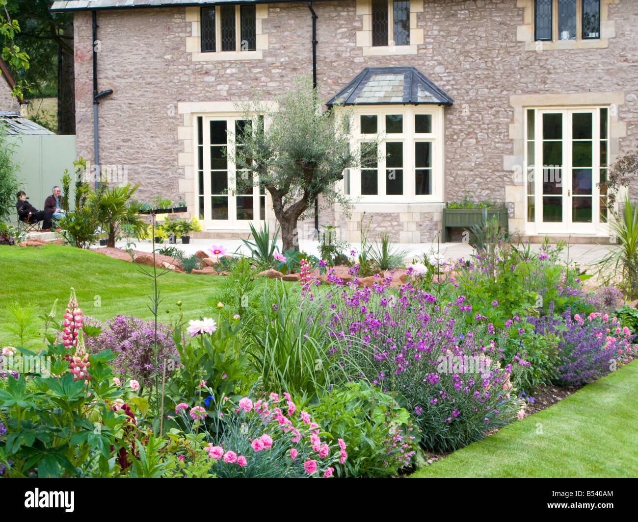 formal flower bed in large garden Stock Photo - Alamy
