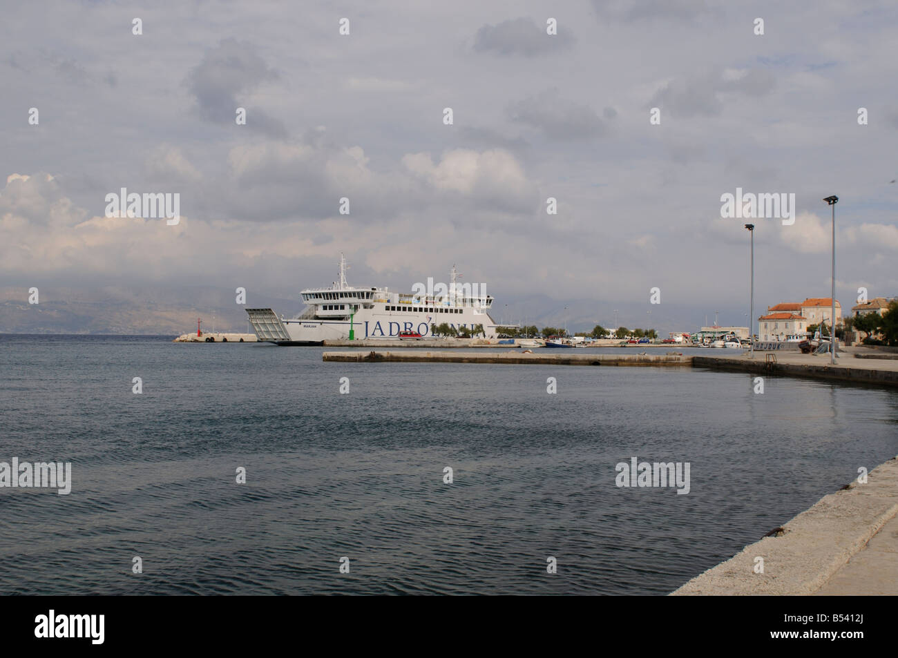 Supetar harbour with a ferry boat on the island of Brac Dalmatia ...