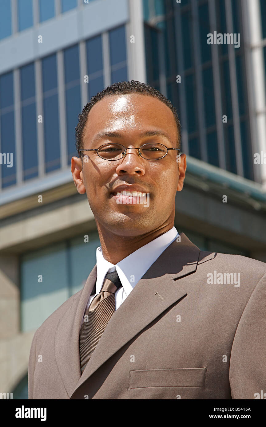 An confident and successful African American businessman in a power ...
