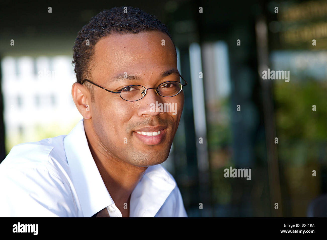 An confident and successful African American businessman in a power ...