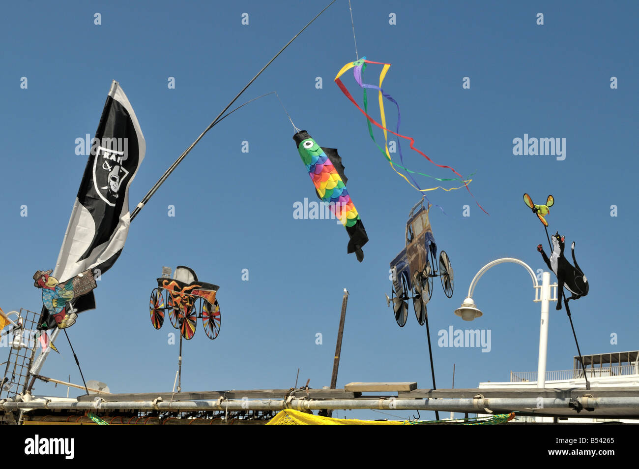 Fanciful, humorous and creative garden wind spinners Stock Photo - Alamy