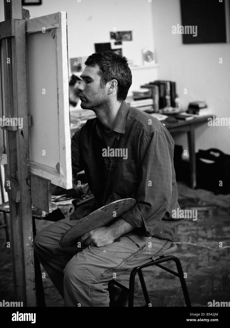 Artist working in his studio at the Old Grammar School, Redruth ...