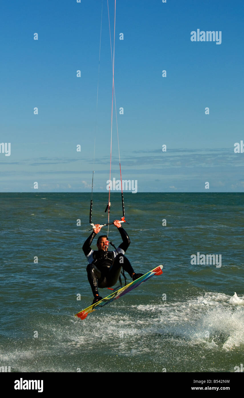 A parasurfer kitesurfer off the beach at Hastings Stock Photo - Alamy