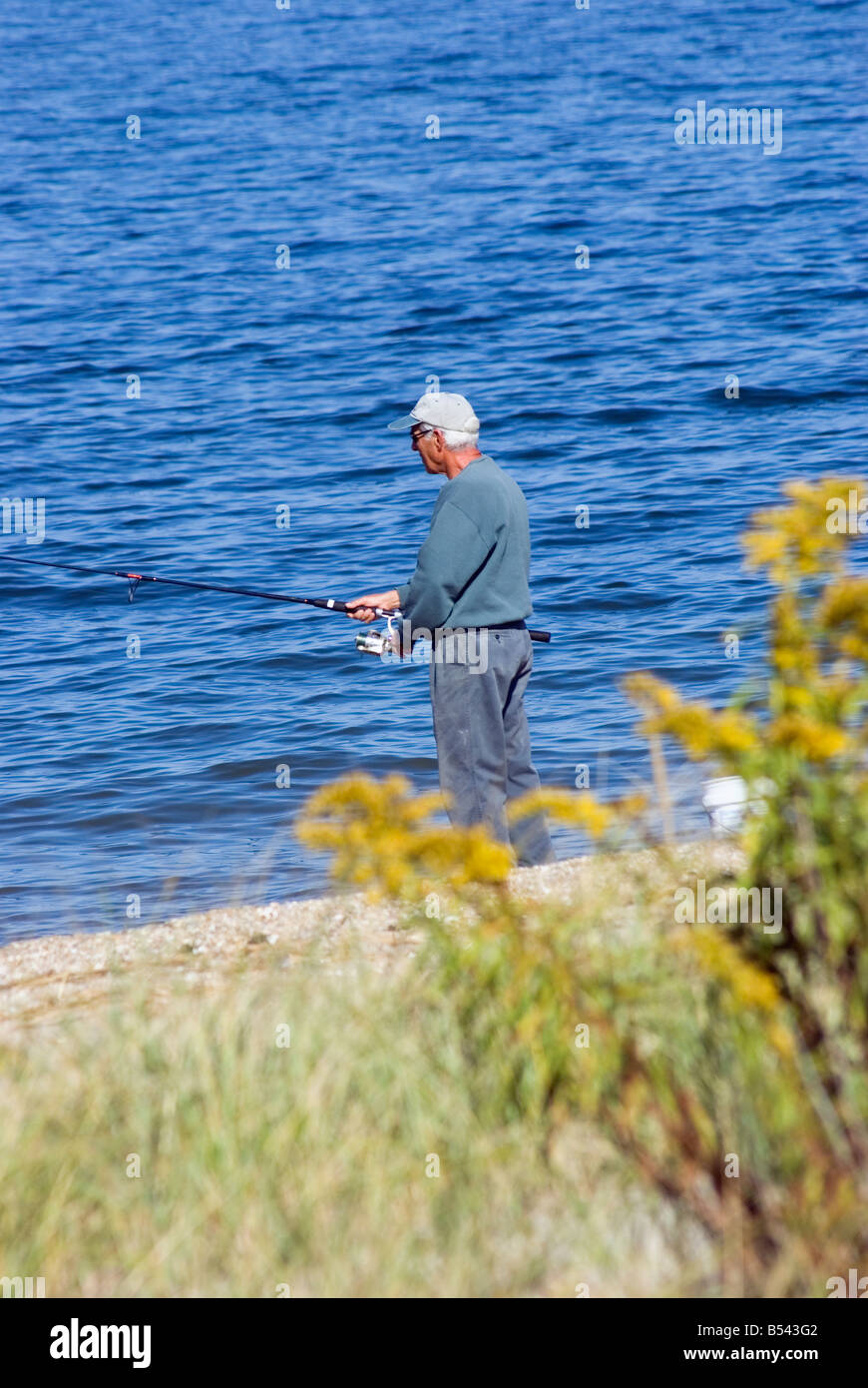 man fishing on beach, Smithtown, Long Island, NY Stock Photo - Alamy