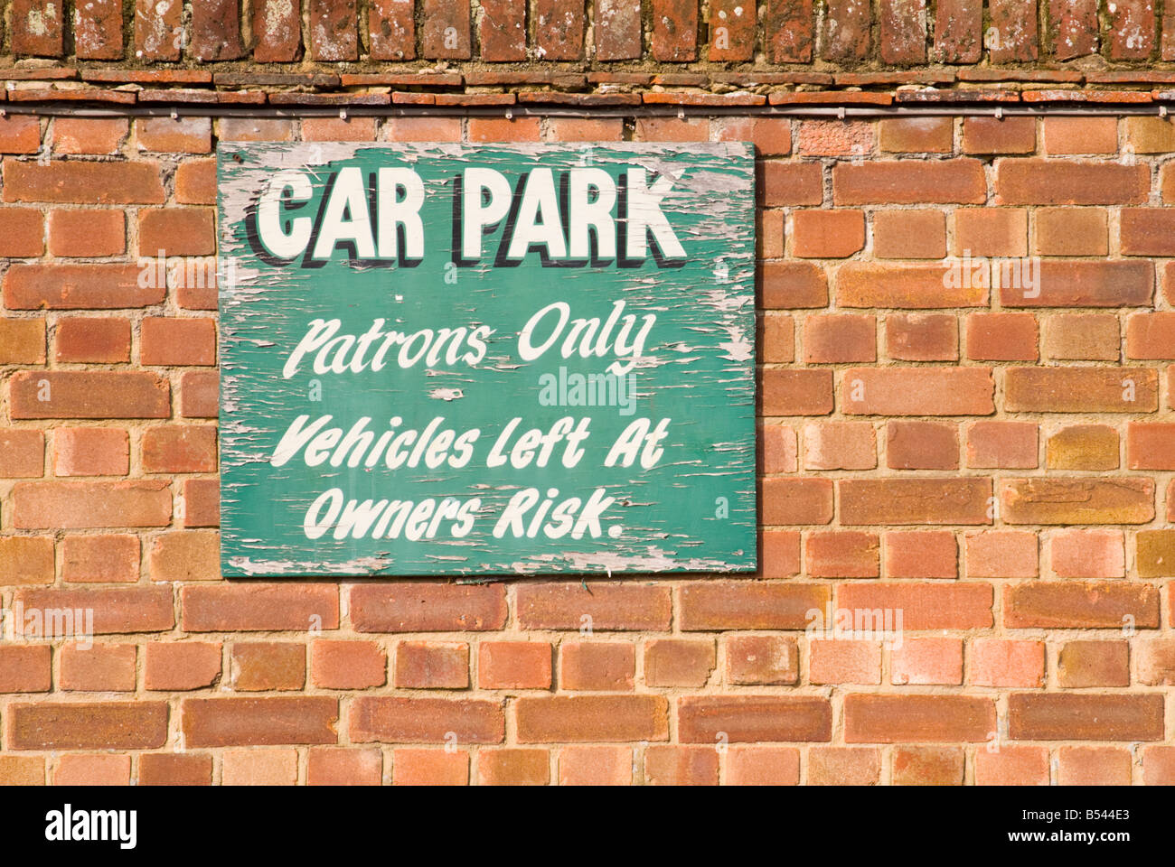 Sign in Uk pub car park stating "Patrons only" and vehicles left at ...