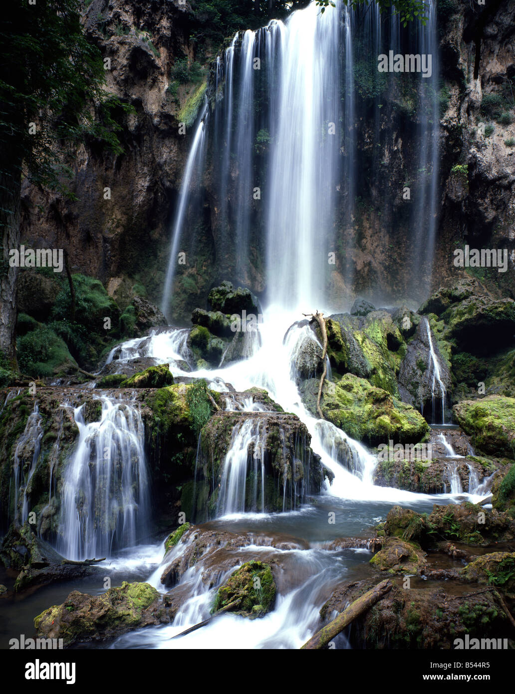 Waterfall in Grotto Stock Photo - Alamy