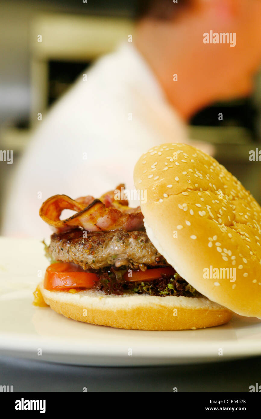 A bacon burger in a white roll Stock Photo - Alamy