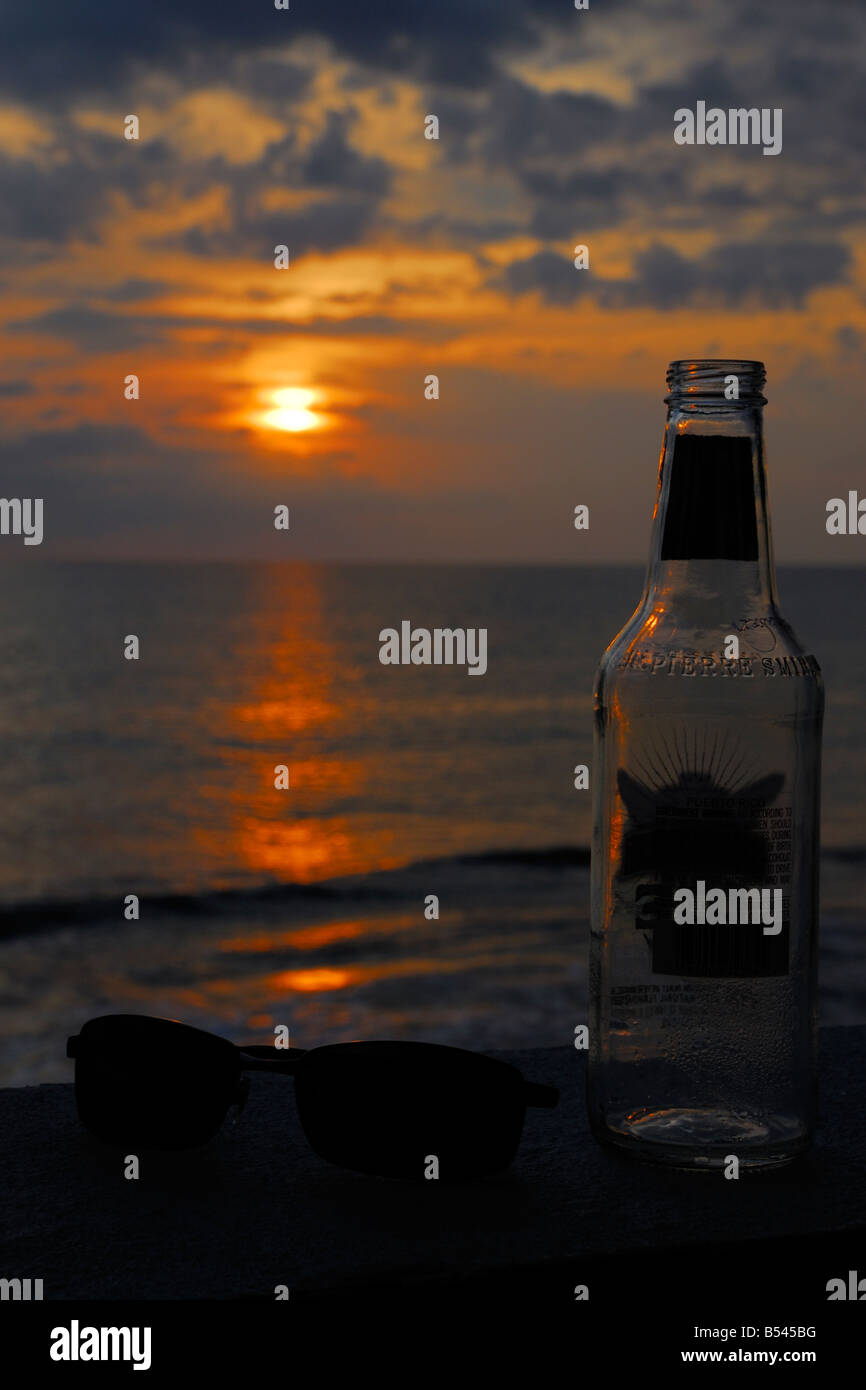 Relaxing and enjoying a drink during a beautiful evening and sunset at ...