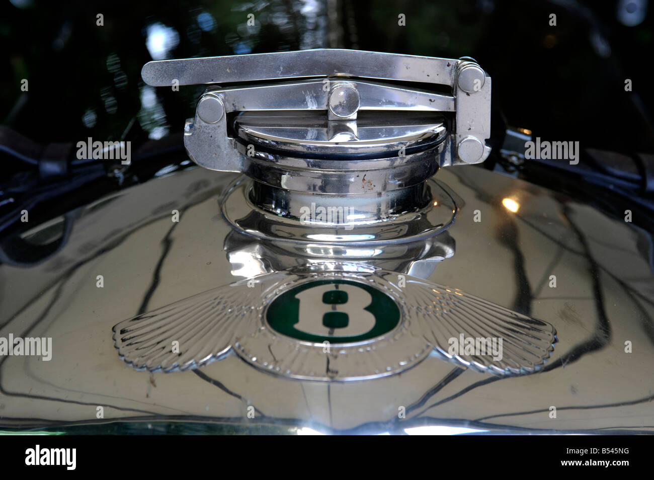 vintage Bentley radiator cap and name plaque Stock Photo - Alamy