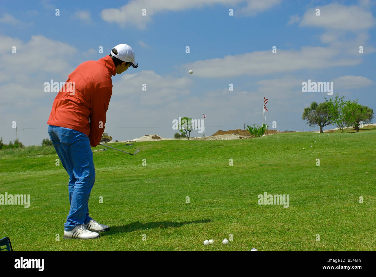 golf player make a shot Stock Photo - Alamy