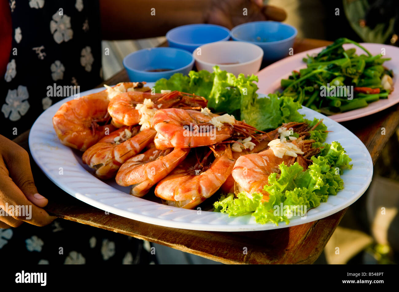 Tasty seafood being served on an ocean front restaurant in the ...