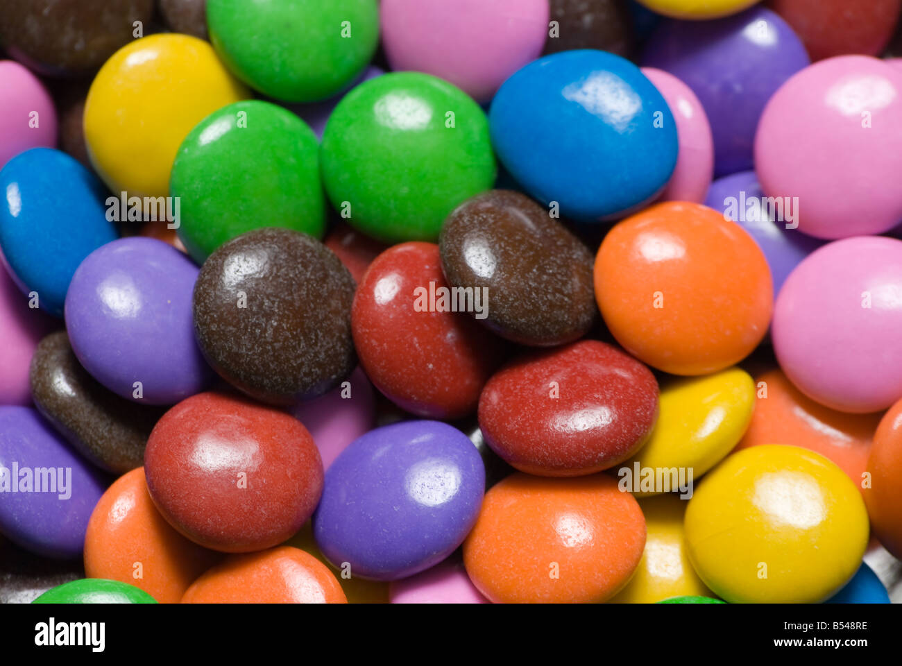 A pile of colourful candies Stock Photo - Alamy
