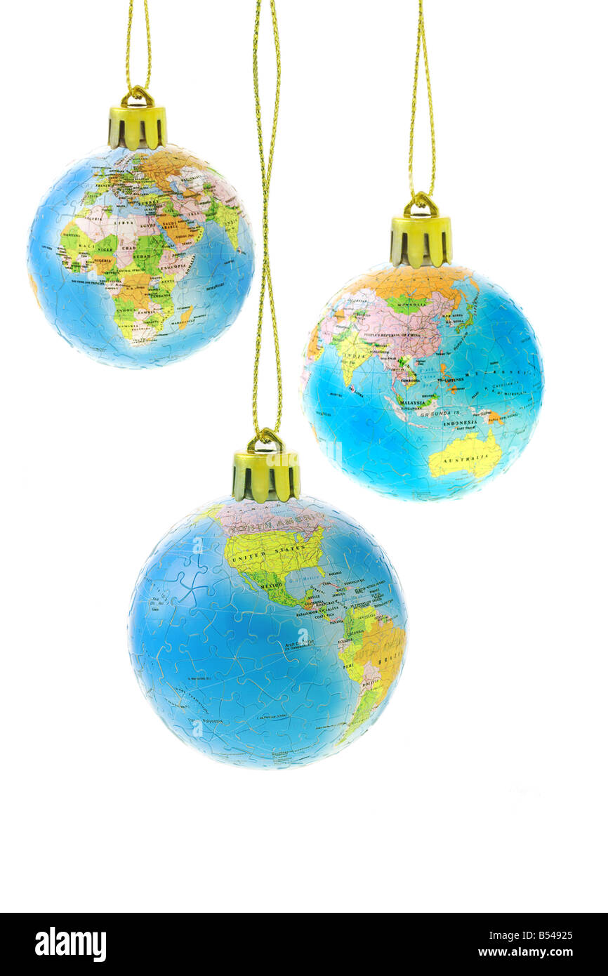 Three Christmas globe ornaments showing all continents on white ...