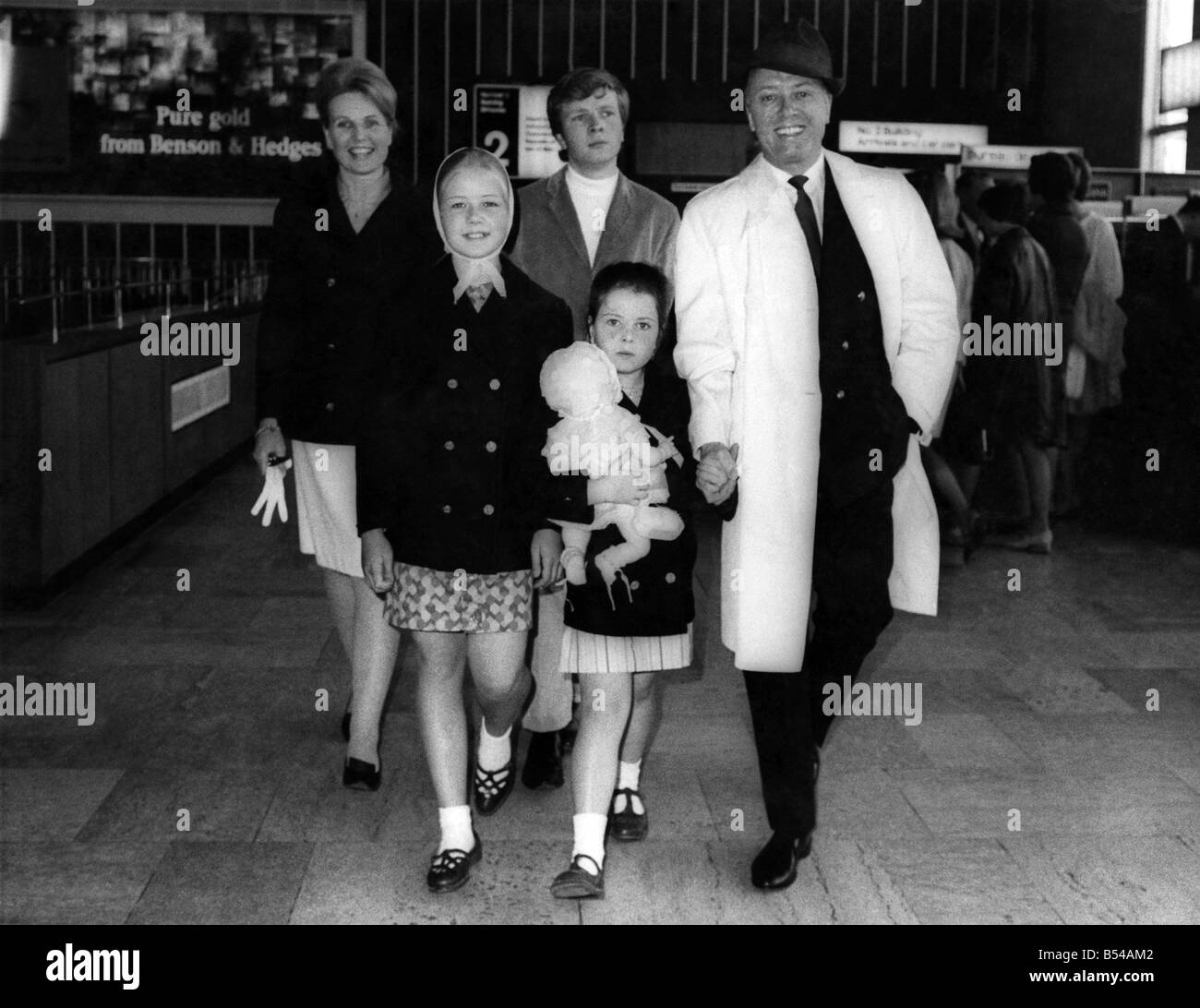 Richard Attenborough and his family left Heathrow Airport on for the ...