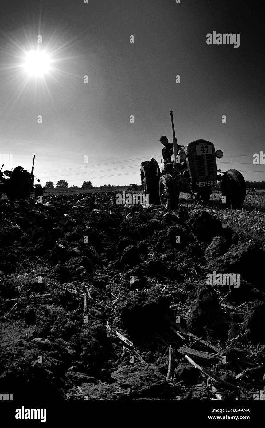Agriculture field preparation tractor Black and White Stock Photos ...