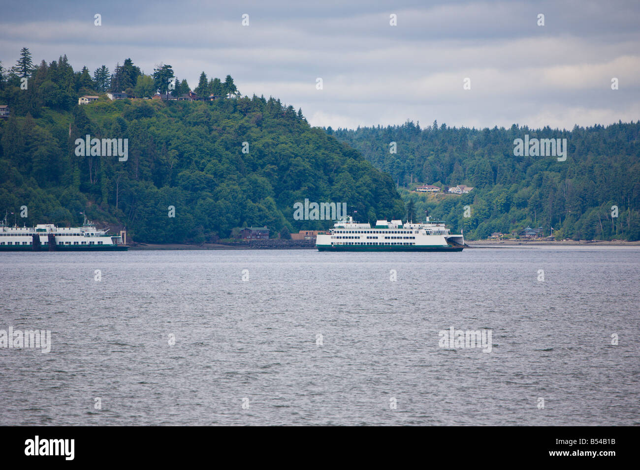 Ferry boat carries commuters to and from Seattle Washington and ...