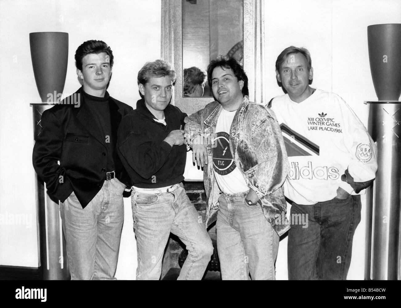 Singer Rick Astley with record producers Mike Stock, Matt Aitken and ...
