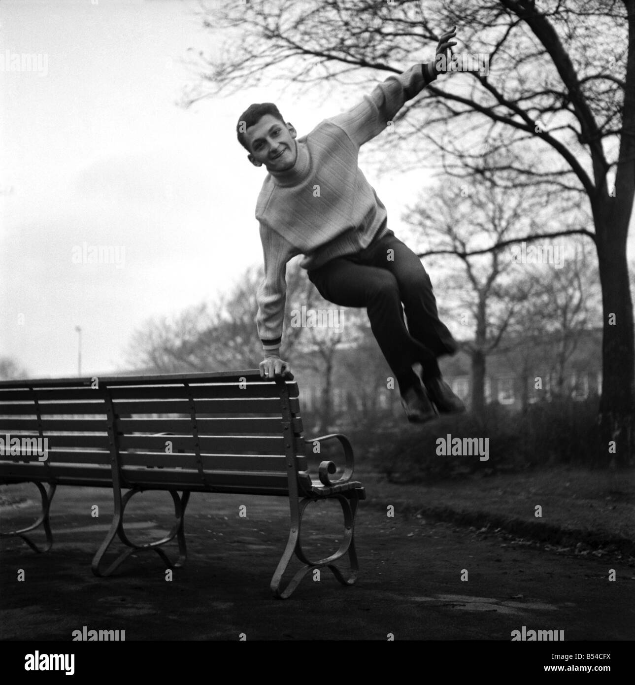 Sport. Football. Liverpool player Steve Peplow leaps in the air by a ...