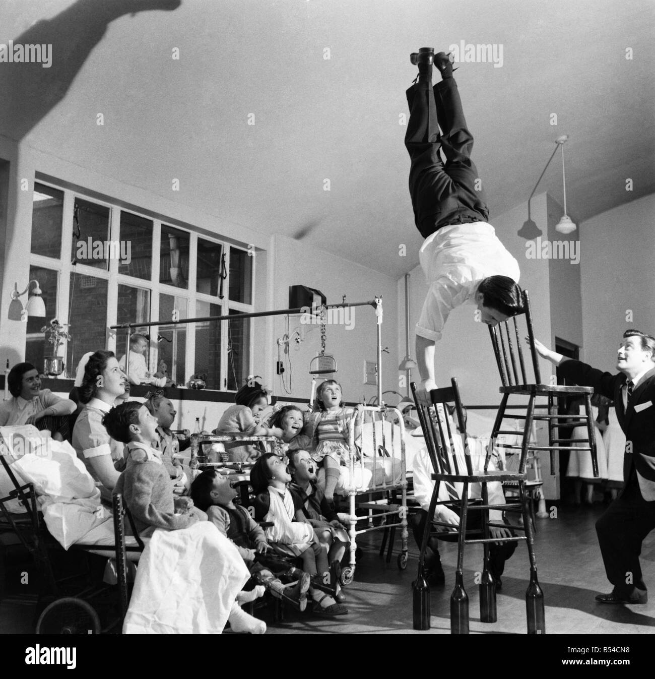 Acrobat Fred Edwards performing at a childrens hospital. May 1953 D2247 ...