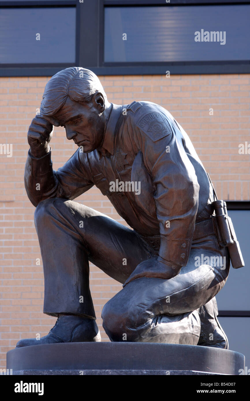 A bronze statue of a Milwaukee County Sheriff kneeling Wisconsin Stock ...