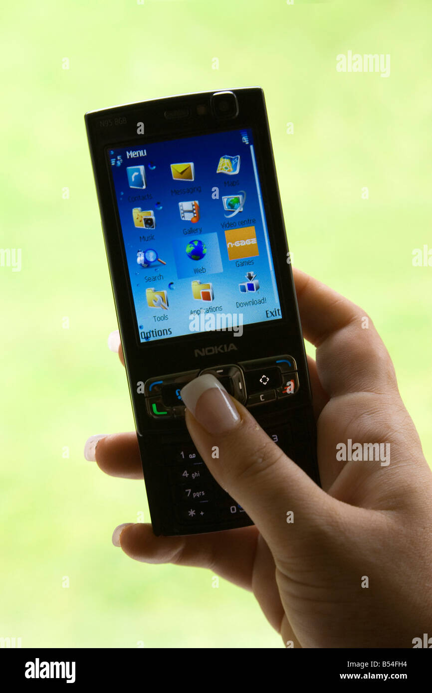 reading screen menu on mobile phone Stock Photo - Alamy