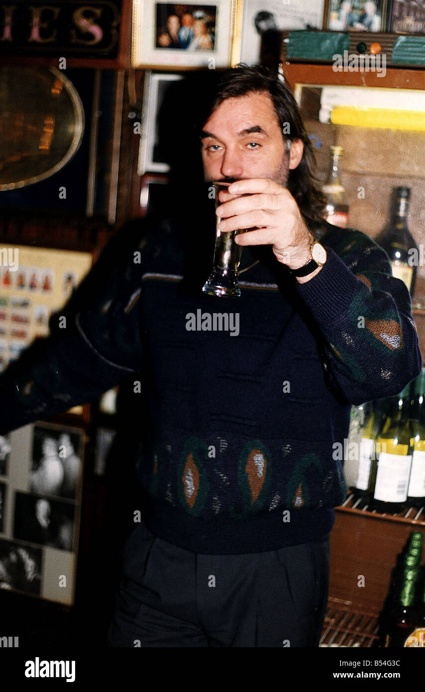 George Best Ex Footballer drinking in his local pub Dbase Stock Photo ...