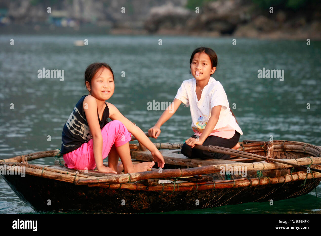 Girls in a rowing boat at Halong Bay, Gulf of Tonkin, Vietnam Stock ...