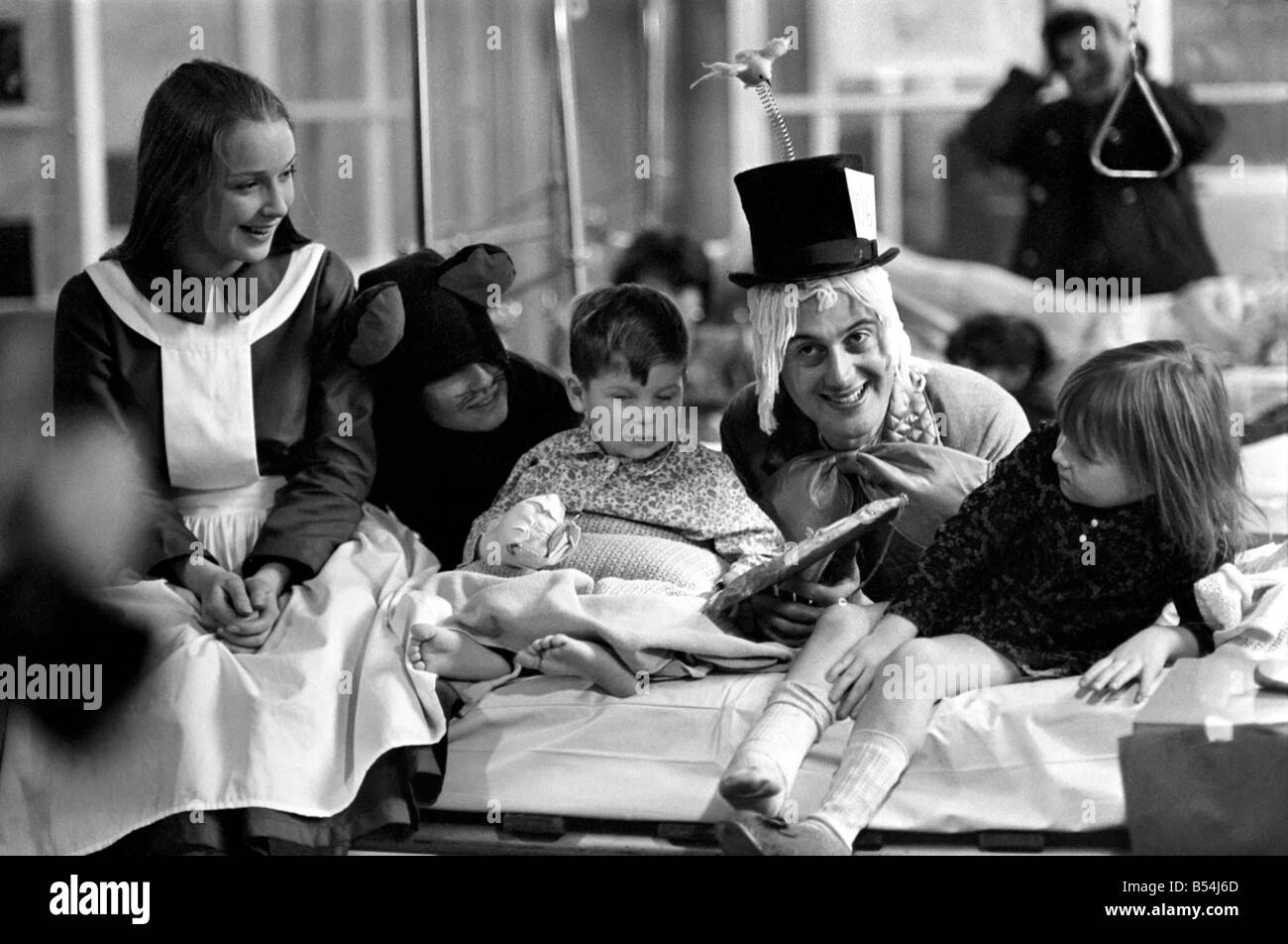 Children of booth hall hospital meet character from Alice in Wonderland ...