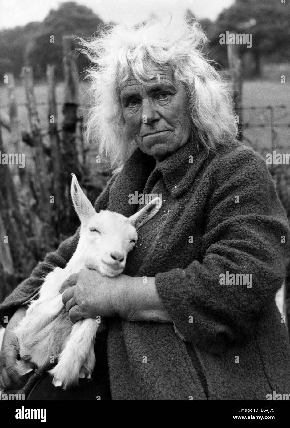 Miss Thompson with Miranda - one of her 50 goats. December 1954 P011772 ...