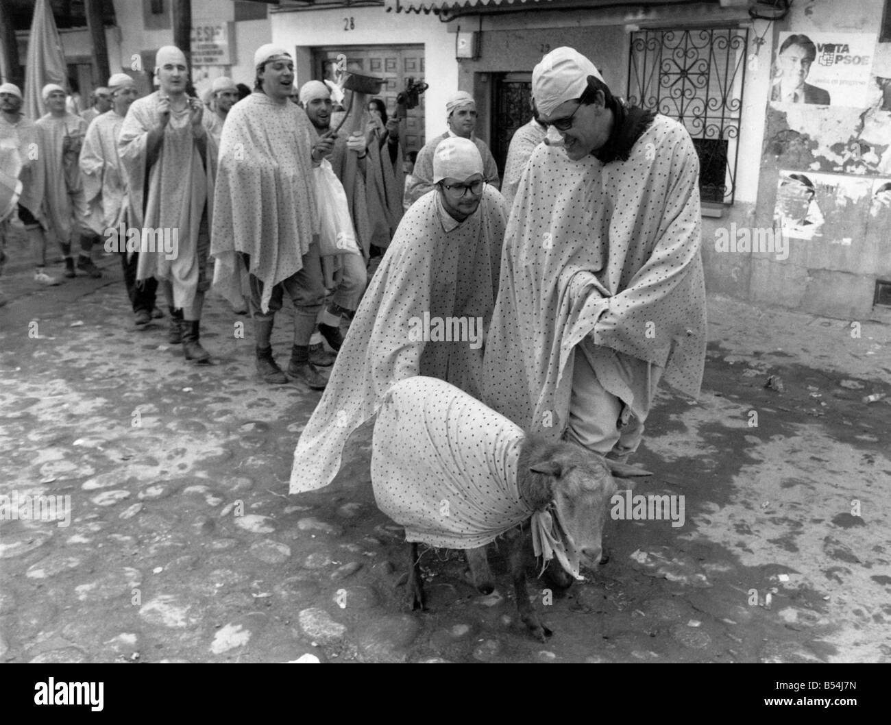 Drunken villagers gloat over their tortured goat during a Spanish bllod ...