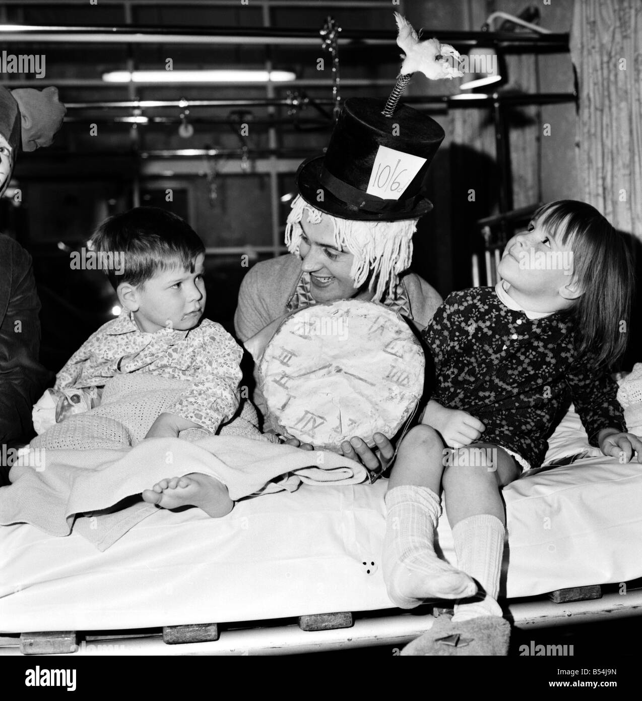 Children of Booth Hall Hospital meet character from Alice in Wonderland ...
