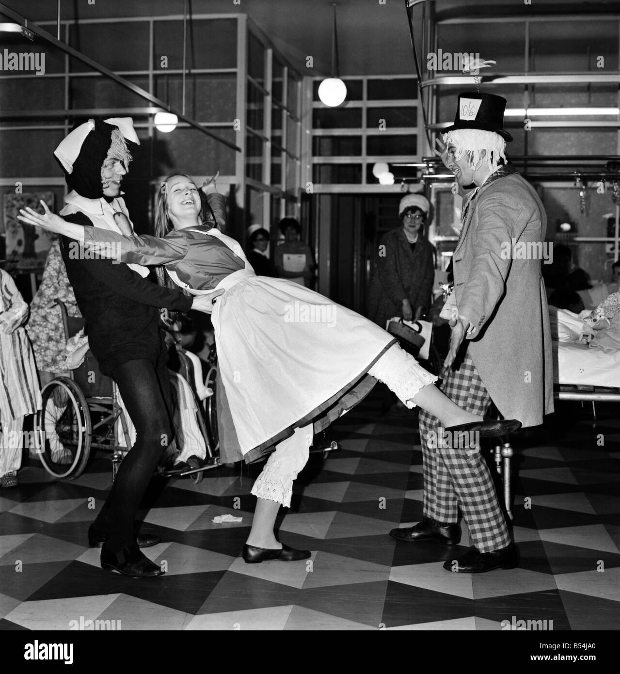 Children of Booth Hall Hospital meet character from Alice in Wonderland ...