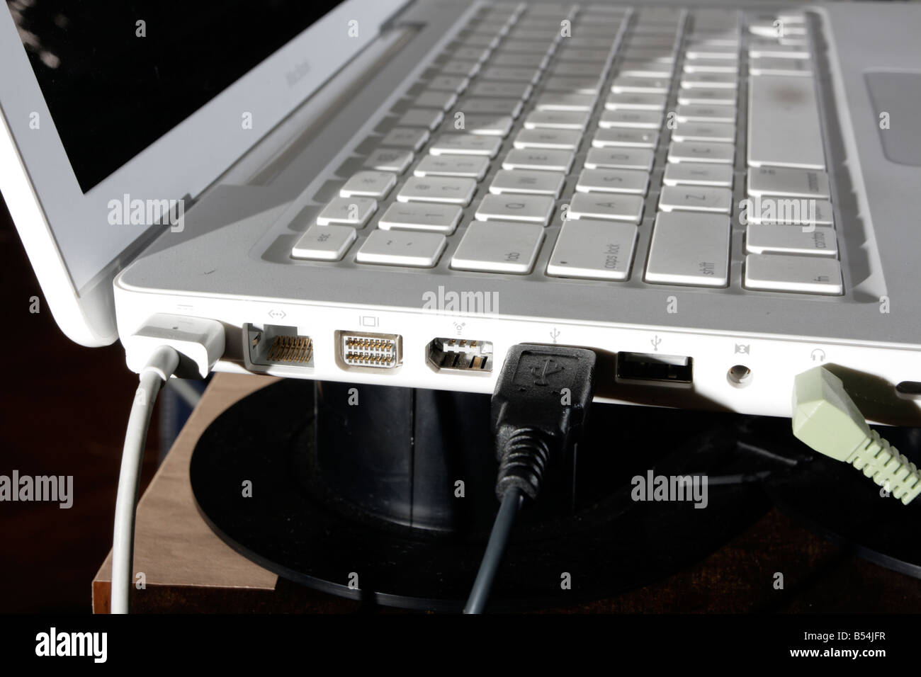 White MacBook laptop computer, left side Stock Photo - Alamy