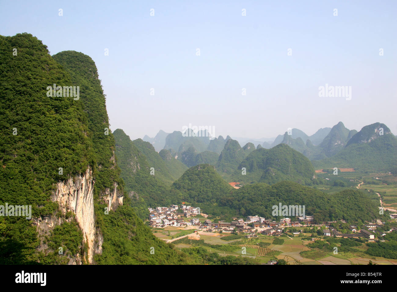 Chinese village at the base of Karsk mountains near Yangshuo China ...