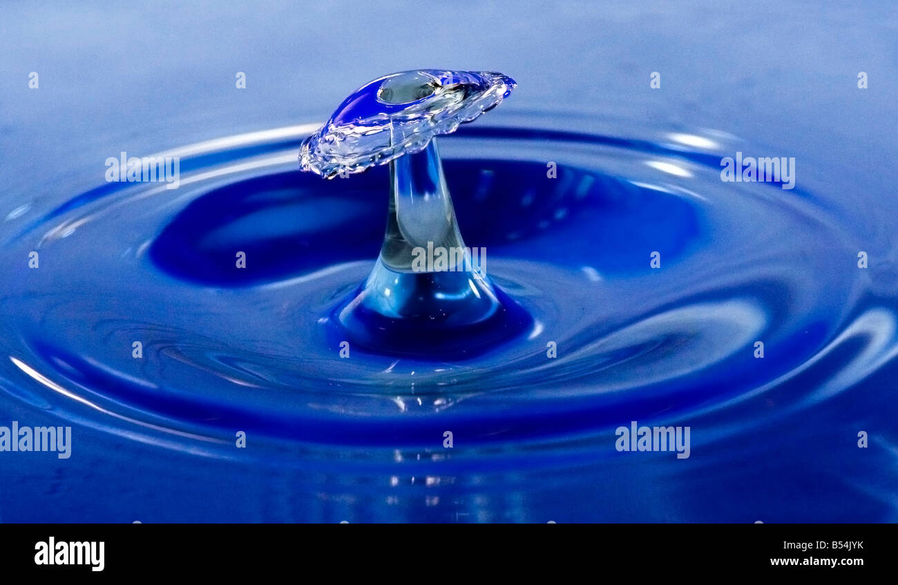 Water droplet splash creating a mushroom effect Stock Photo - Alamy