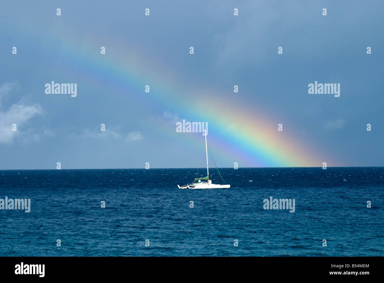 Rainbow over Ocean Stock Photo - Alamy