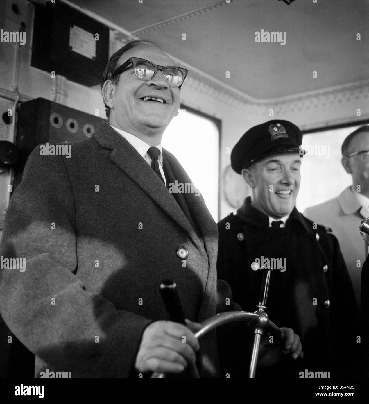 Fred Mulley, Minister of Transport, steered the ferry across the Mersey ...