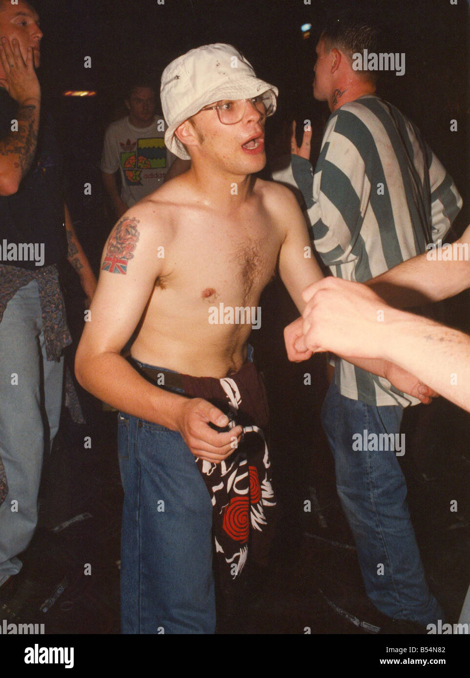 Clubbers get hot and sweaty enjoying a rave Stock Photo - Alamy