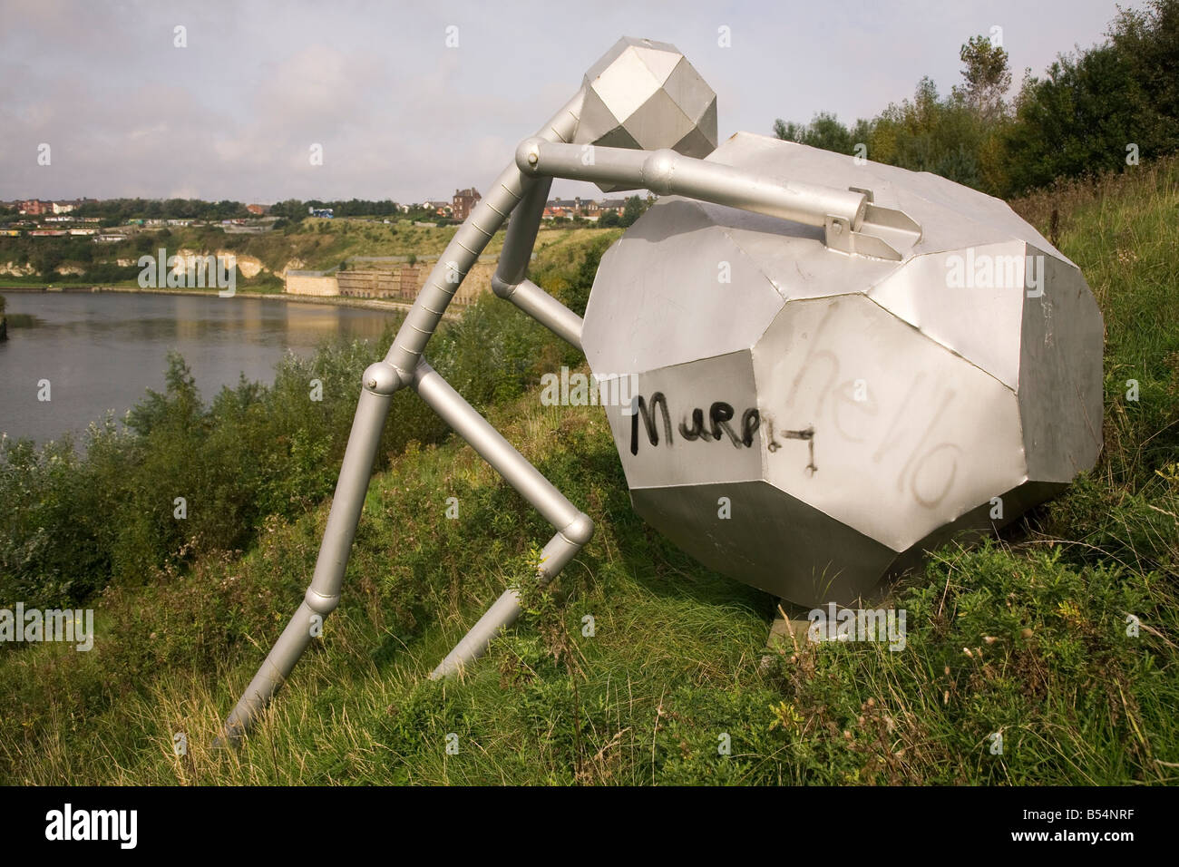 8 foot high steel men statues are by artist Graeme Hopper and stand on ...