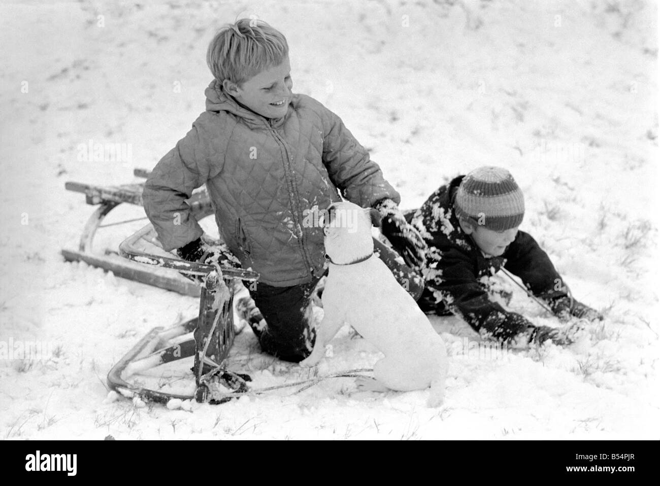 Weather snow scenes at Hampstead Heath. Winter: A spill at the bottom ...